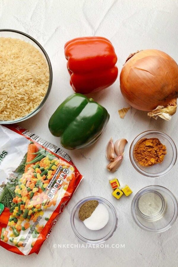 Nigerian Fried Rice Recipe with Baked Chicken - Nkechi Ajaeroh